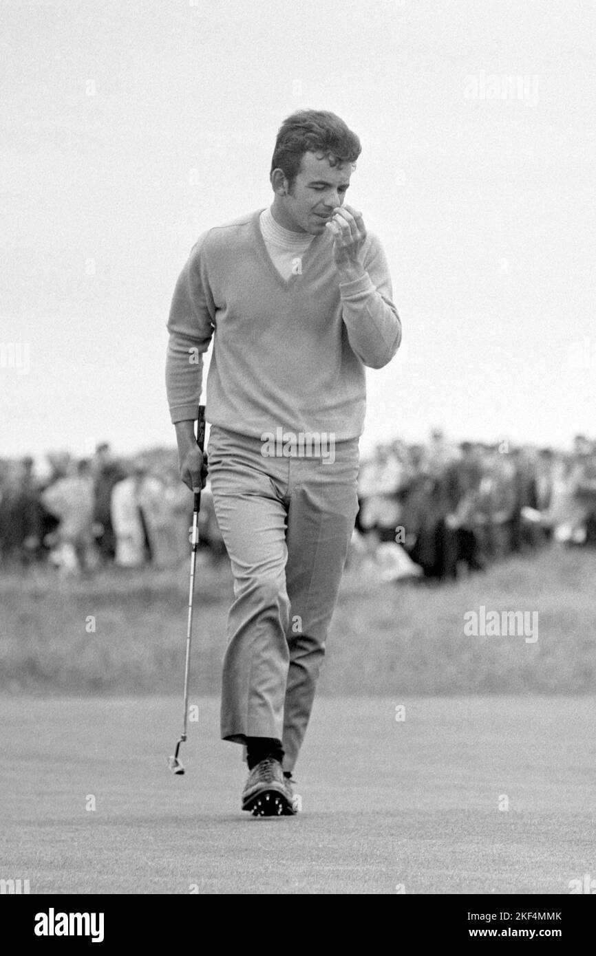 English golfer Tony Jacklin with his putter on the green on his way to ...