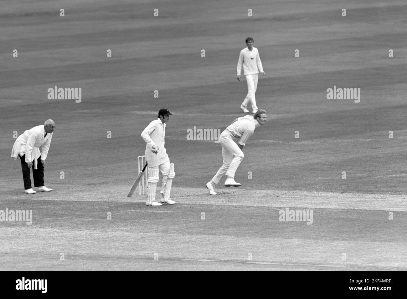 South African born cricketer Tony Greig bowling for Sussex Stock Photo ...
