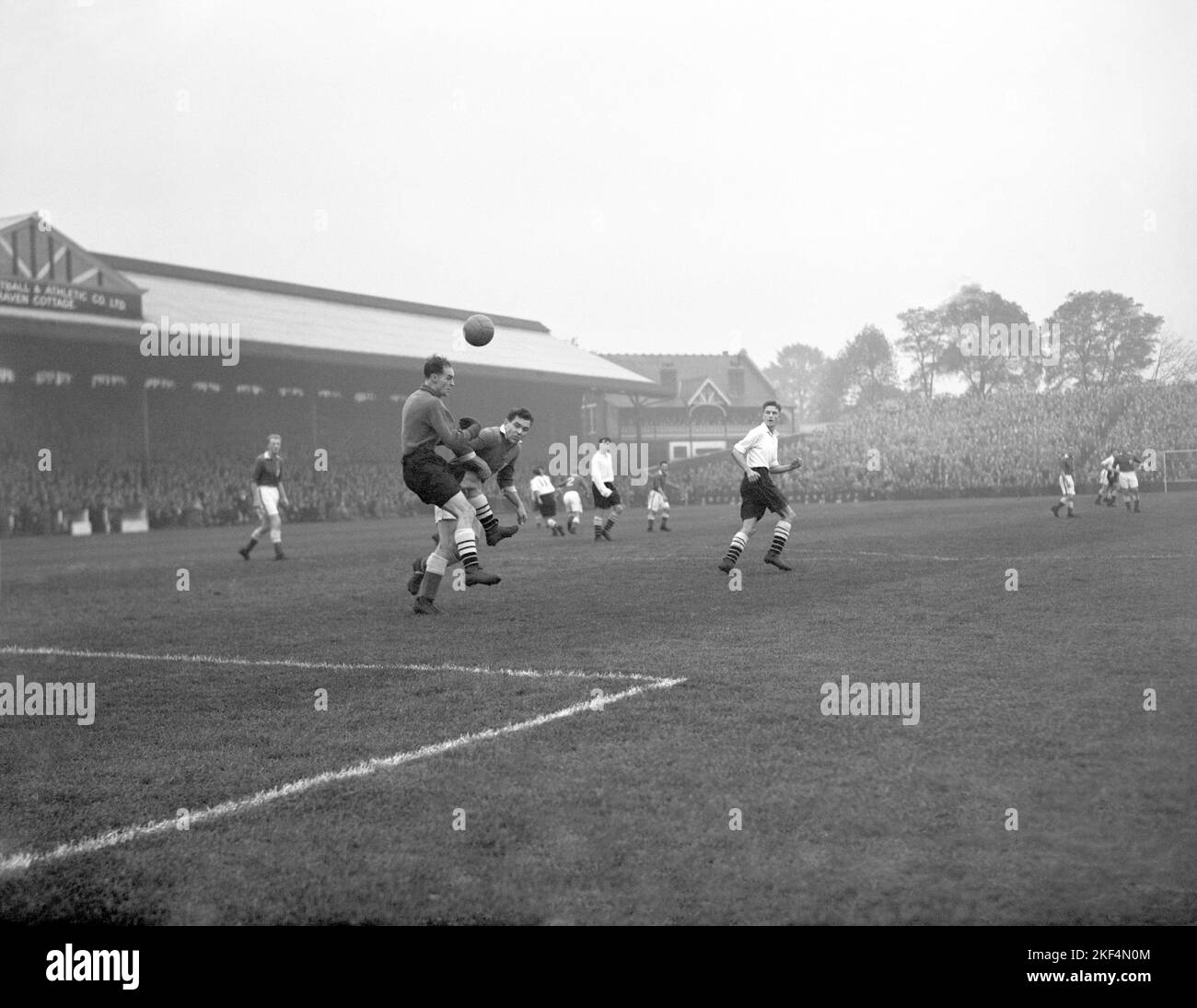 Fulham goalkeeper Ian Black drops a ball after colliding with Leicester ...