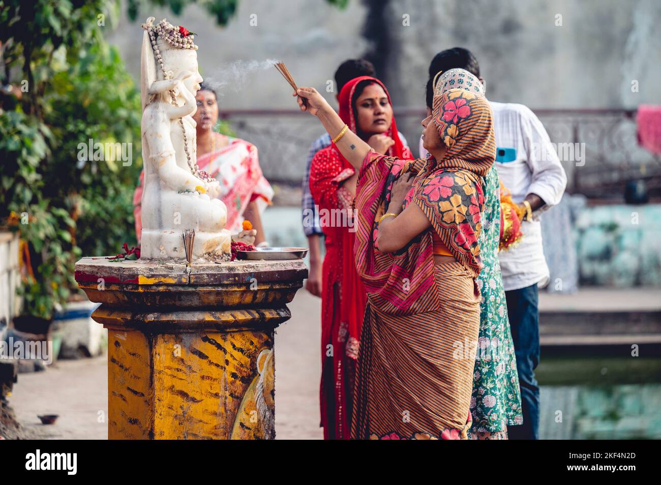 The Women, praying to idols and guards at the Narasimha Hindu temple in ...