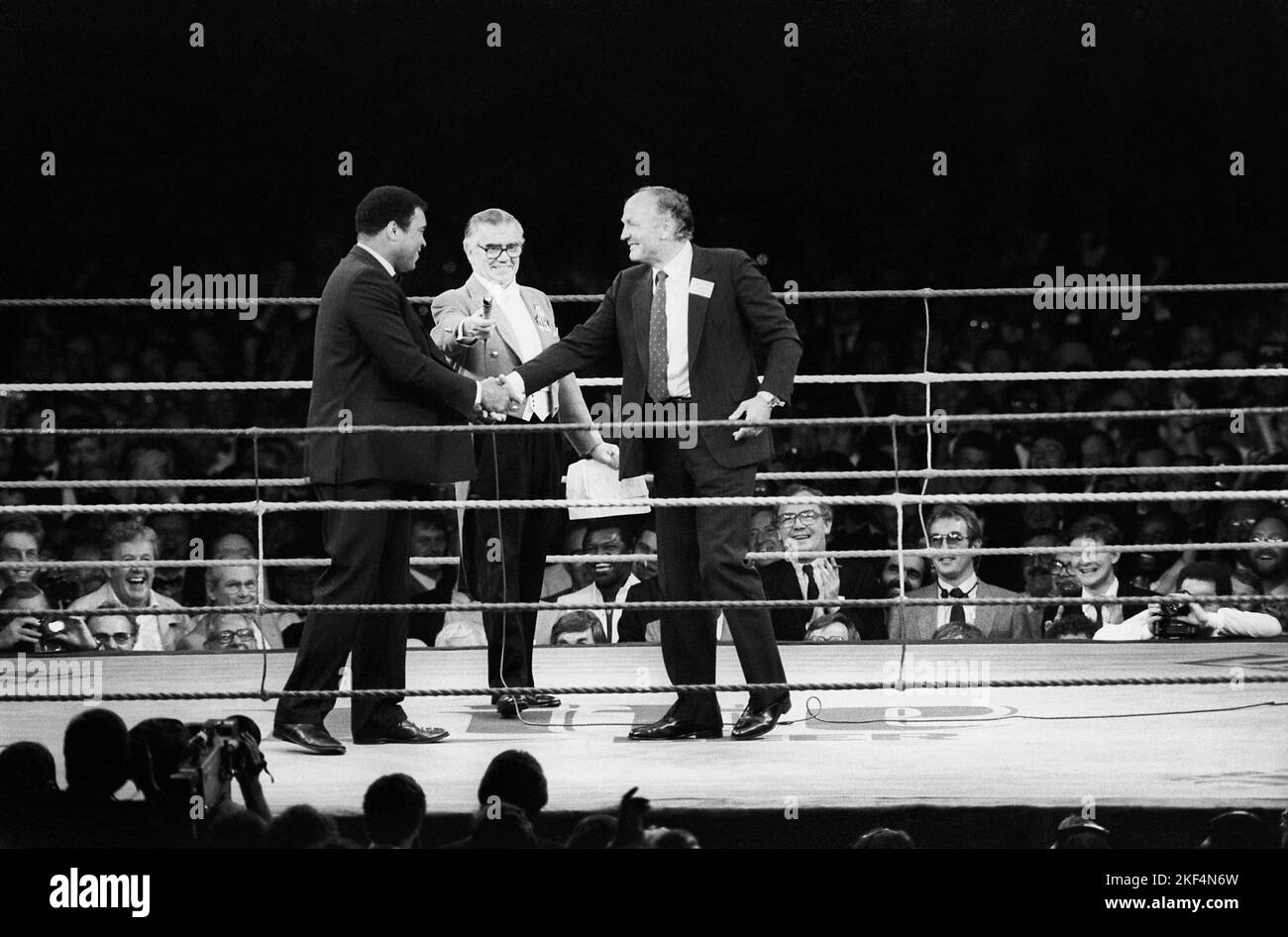 Henry Cooper and Muhammad Ali shake hands before the WBA Title Bout ...