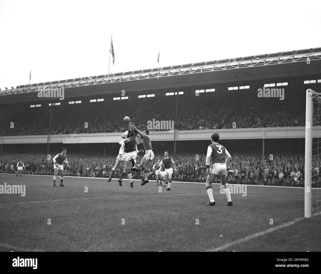 Ipswich Town goalkeeper Roy Bailey punches the ball clear of Arsenal's ...
