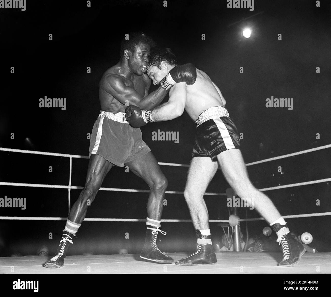 Great Britain's Dave Charnley (r) hits World Champion Emile Griffith (l ...