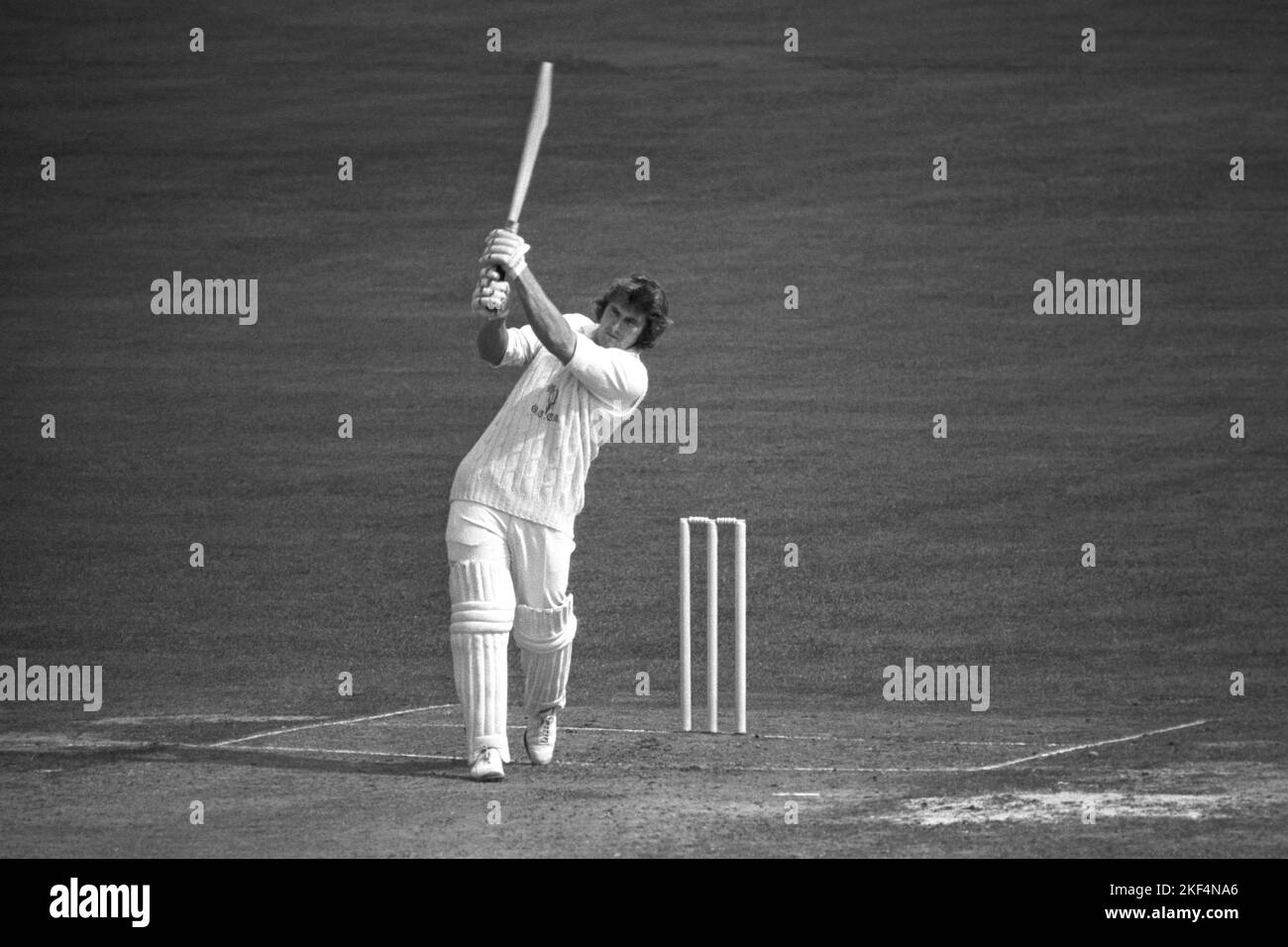 Glamorgan's Mike Llewellyn drives a fine six off Middlesex bowler Mike ...