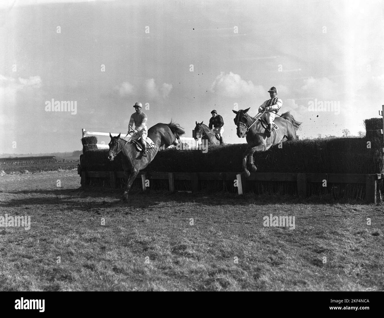 'Hunting Gate' with F. O'Connor up (r), takes the open ditch with ...
