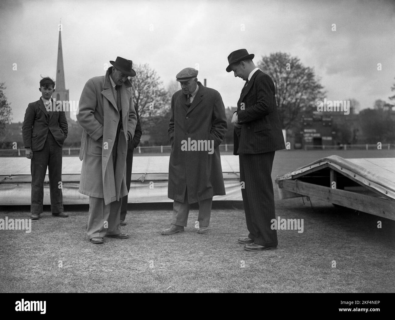 South Africa captain Alan Melville (l) inspects the pitch with ...