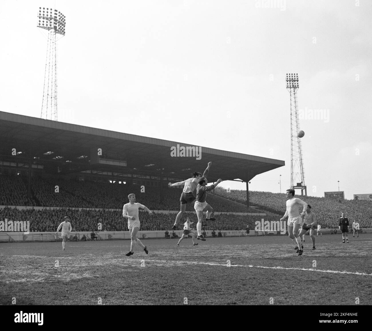 Sheffield Wednesday goalkeeper Ron Springett punches the ball clear of ...