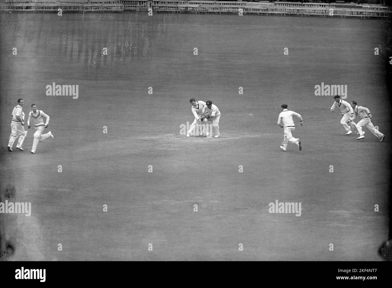 Australia's Keith Miller (l) and wicketkeeper Don Tallon wrestle for ...