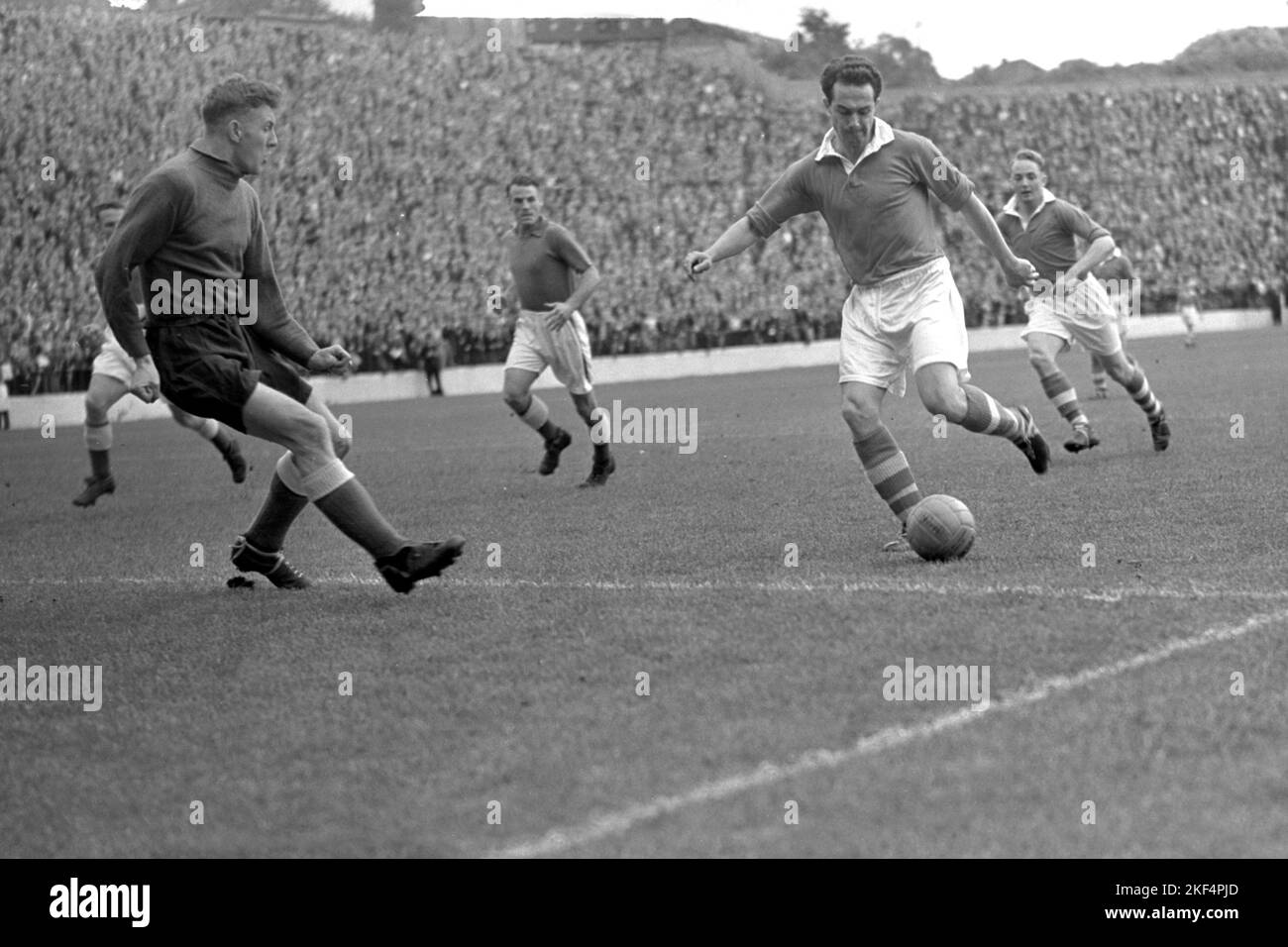 Everton goalkeeper James O'Neill (left) and Charlton's Stuart Leary ...
