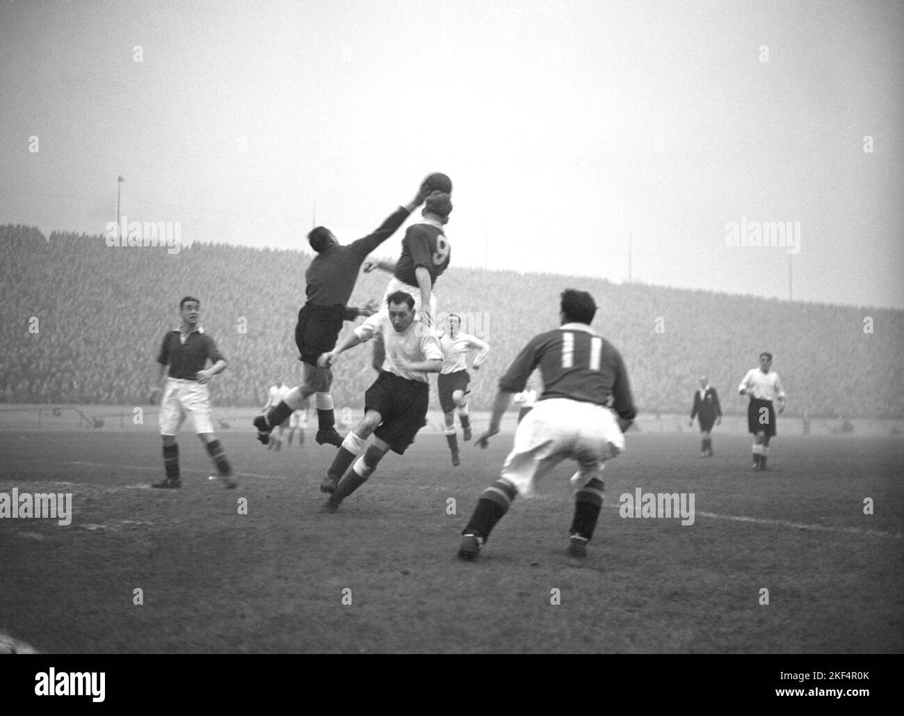 Chelsea goalkeeper Harry Medhurst punches the ball clear of Everton's ...