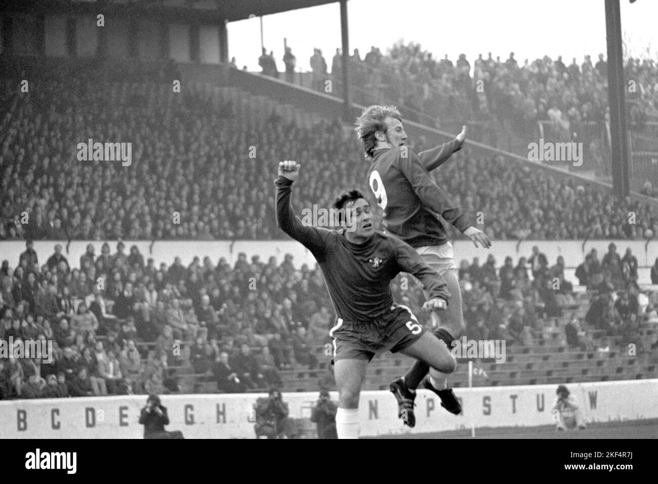 (L-R) Chelsea's Ron Harris is beaten by Birmingham City's Kenny Burns ...