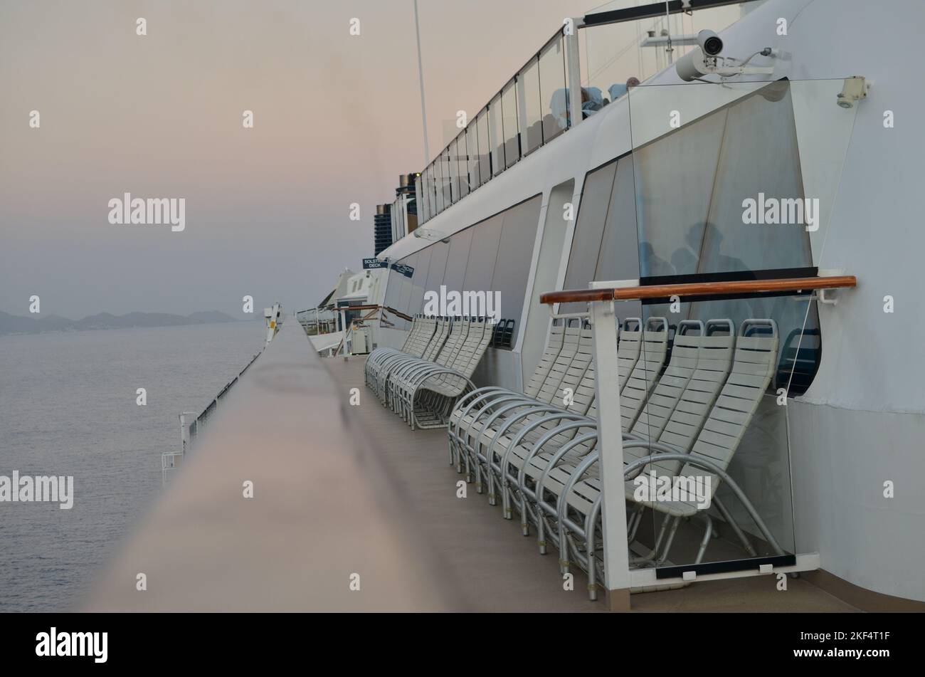sunset Cruise ship deck chair caribbien sea caribic Stock Photo - Alamy