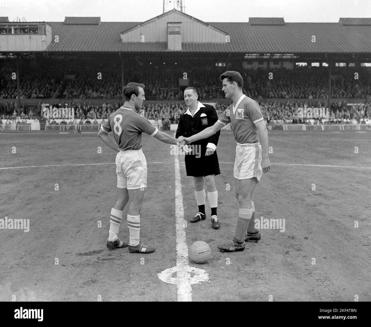 Referee MJS Pickles (c) looks on as Chelsea's Jimmy Greaves (l ...