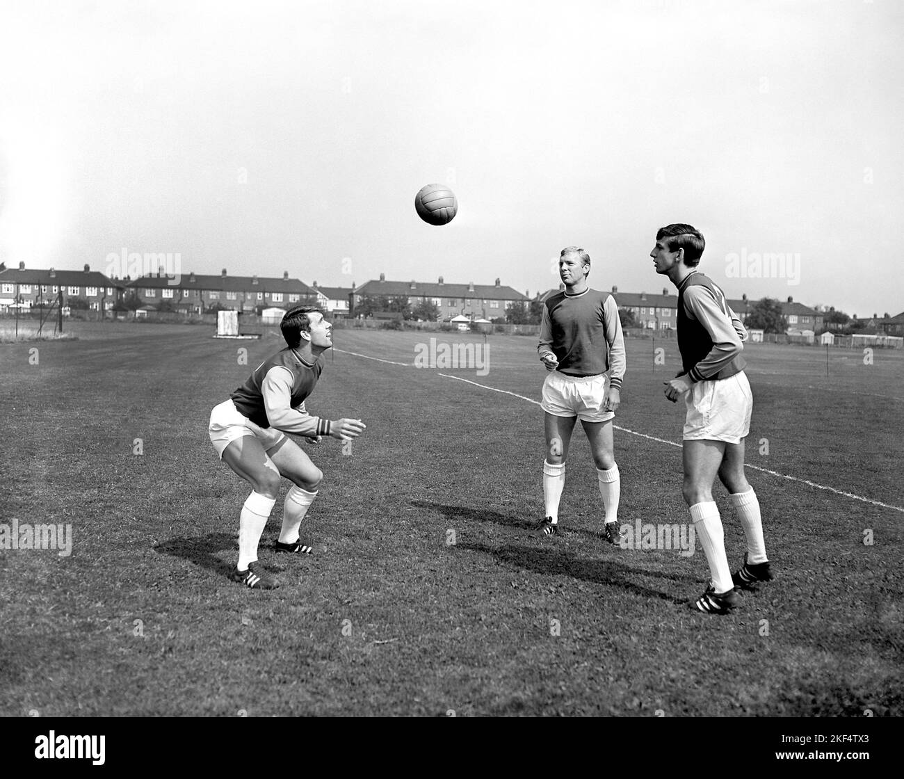 Geoff Hurst, Bobby Moore and Martin Peters during West Ham training at ...