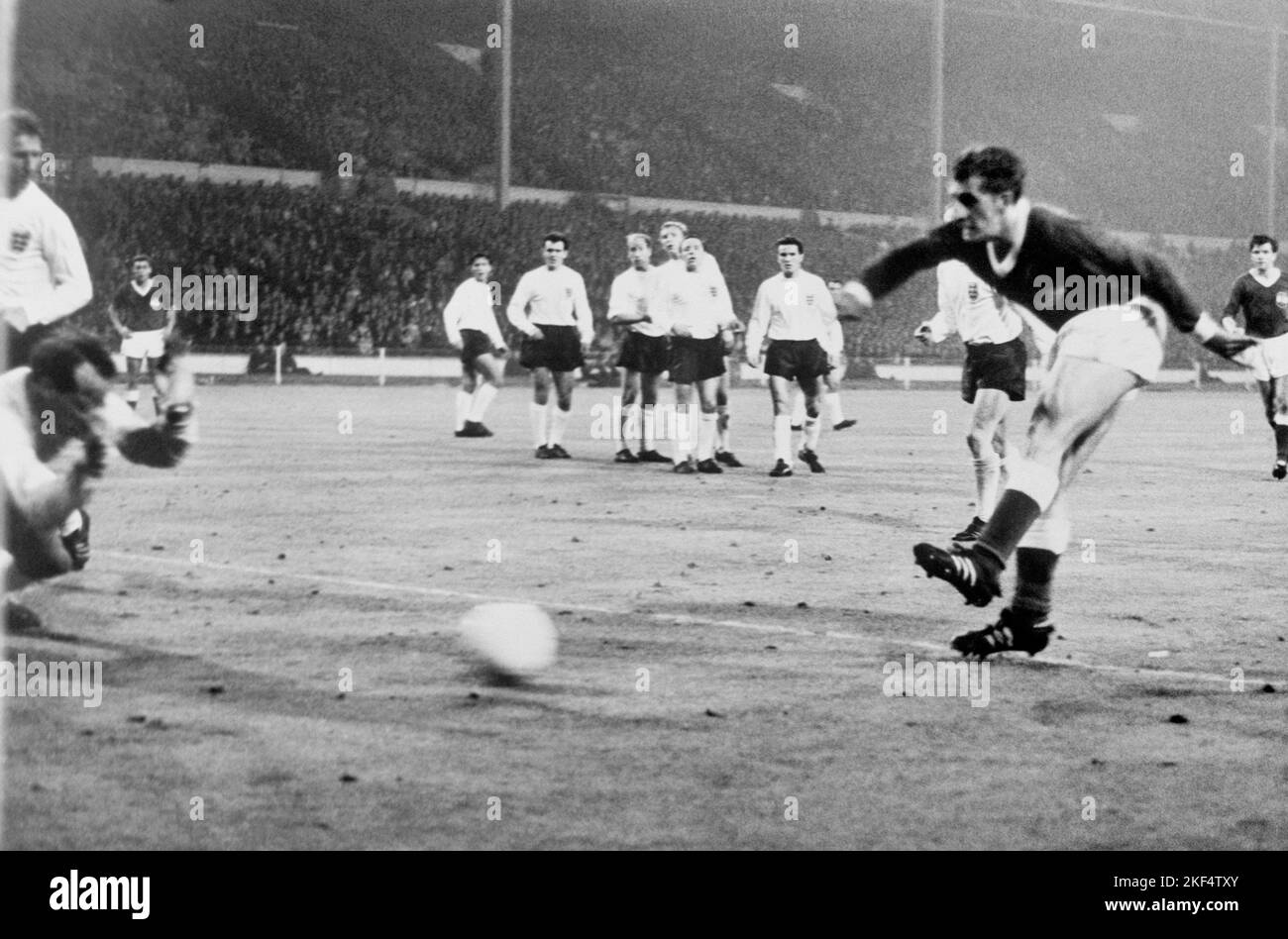 Austria's Anton Fritsch (r) fires his team's second goal past England ...