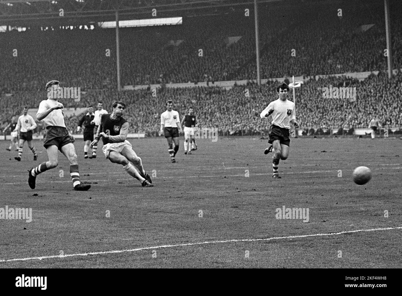 West Ham United's Geoff Hurst (second l), watched by Preston North End ...