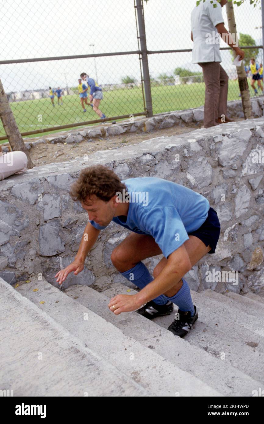 England captain Bryan Robson hops up a flight of steps during a fitness ...