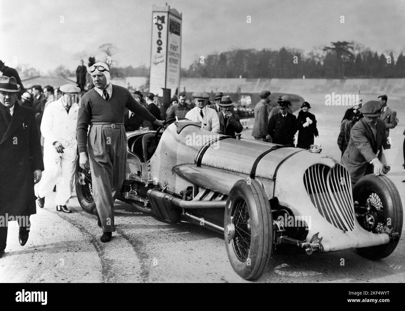 John Cobb alongside his Napier land speed record car at Brooklands race ...