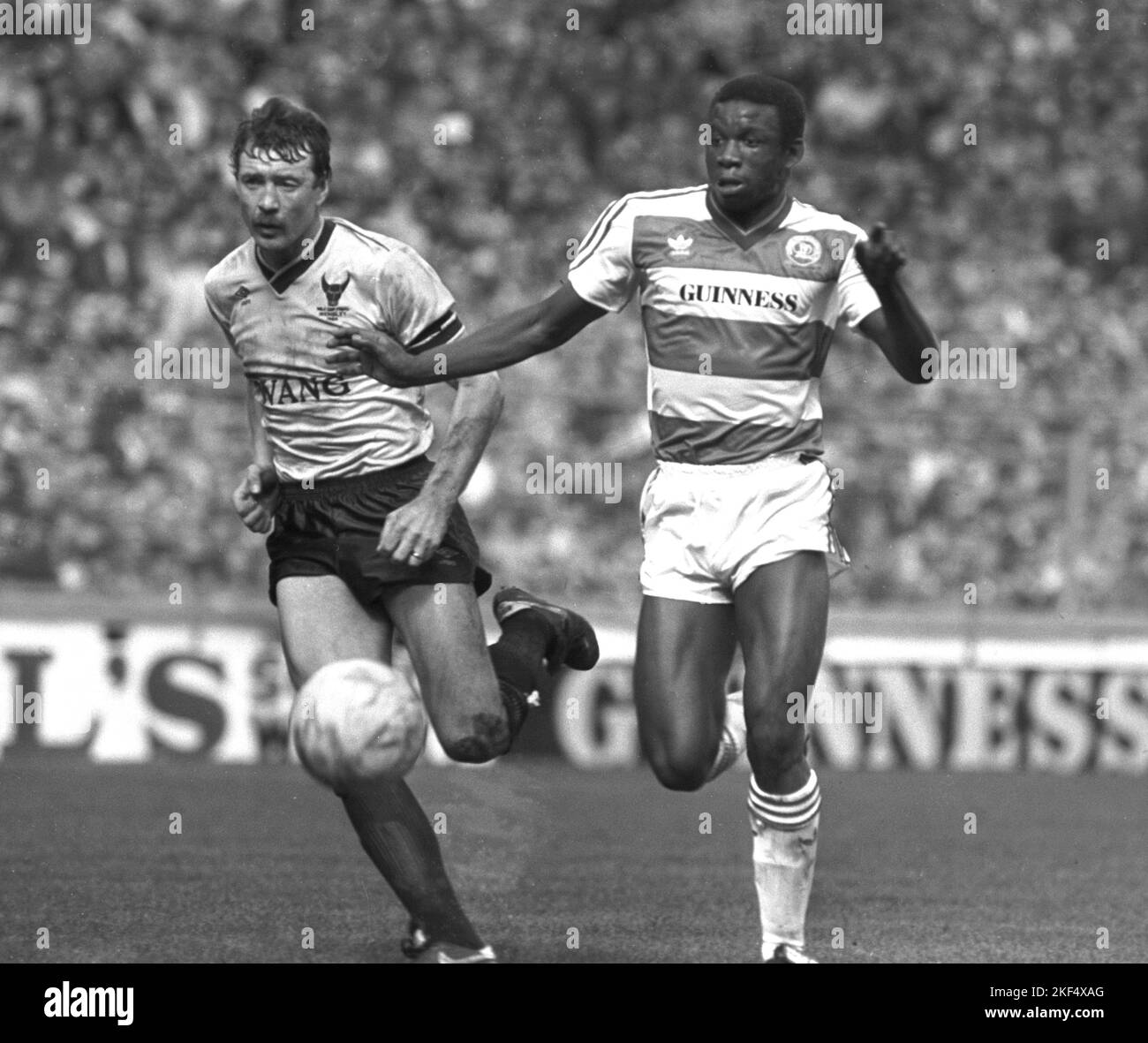 Malcolm Shotton (Oxford) and Leroy Rosenior (QPR) during the Milk Cup ...
