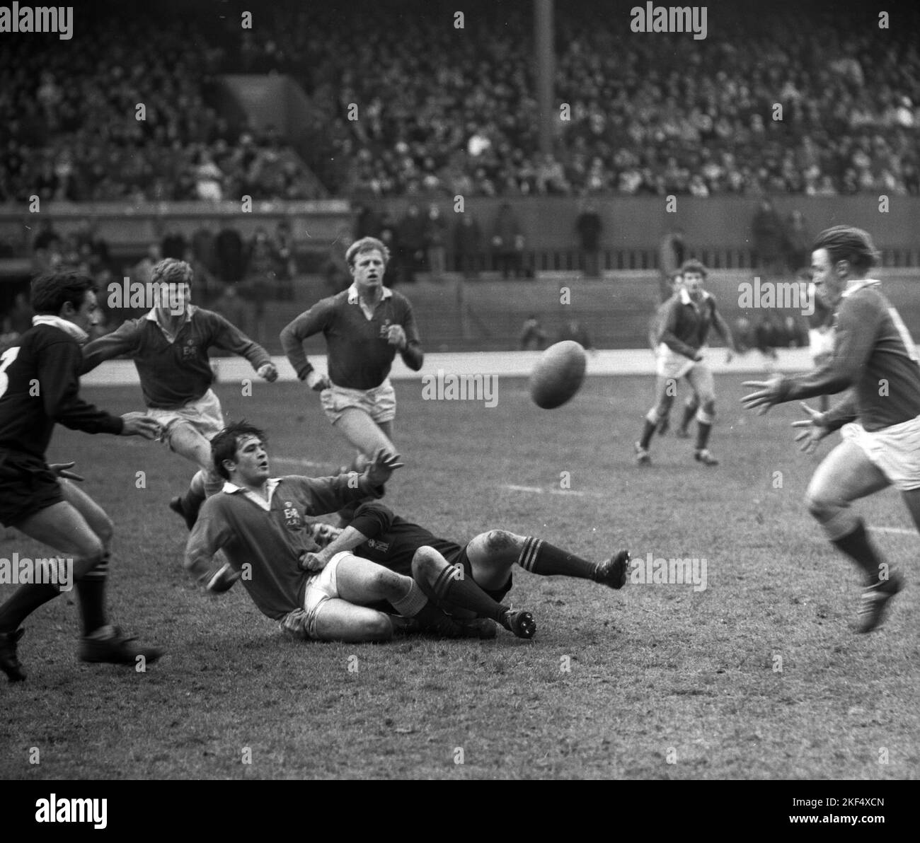 The Navy scrum half M.C. Gretton tackles the Army scrum half D ...