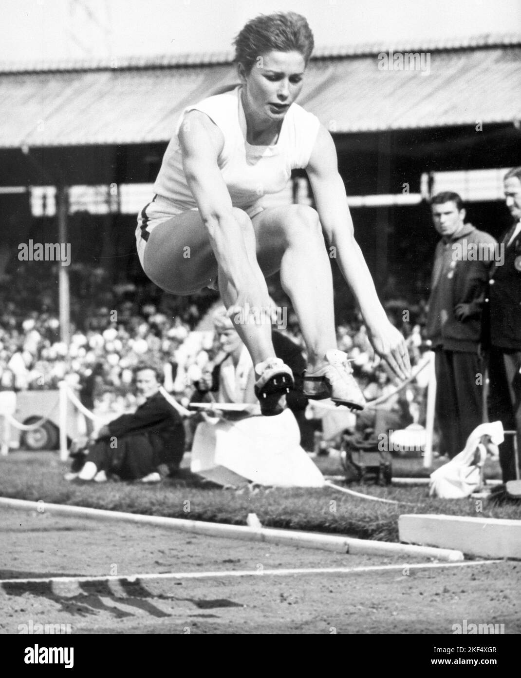 Mary Rand in action during the Long Jump at White City, London Stock ...