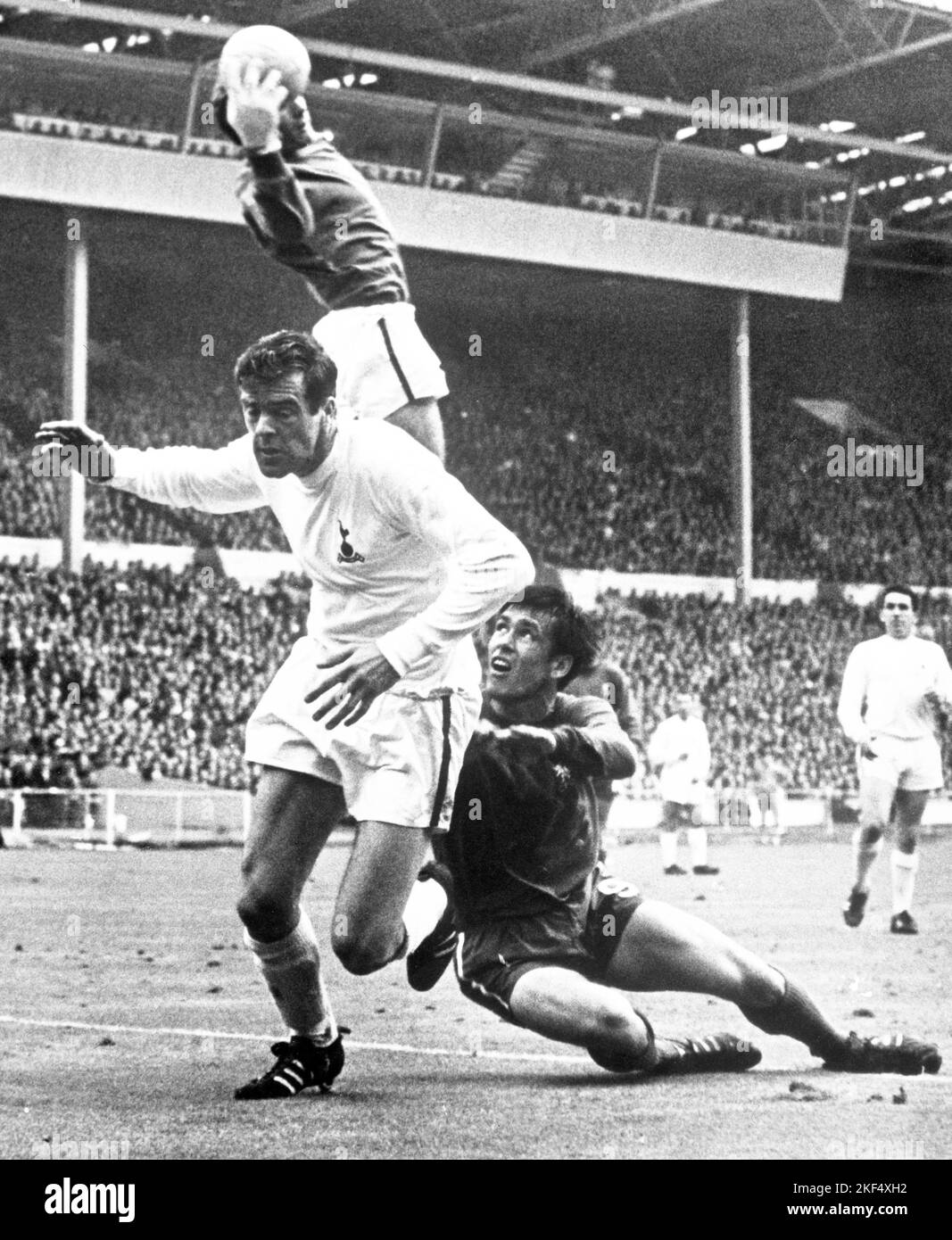 Goalkeeper Pat Jennings (Tottenham Hotspur) leaps to save from the ...