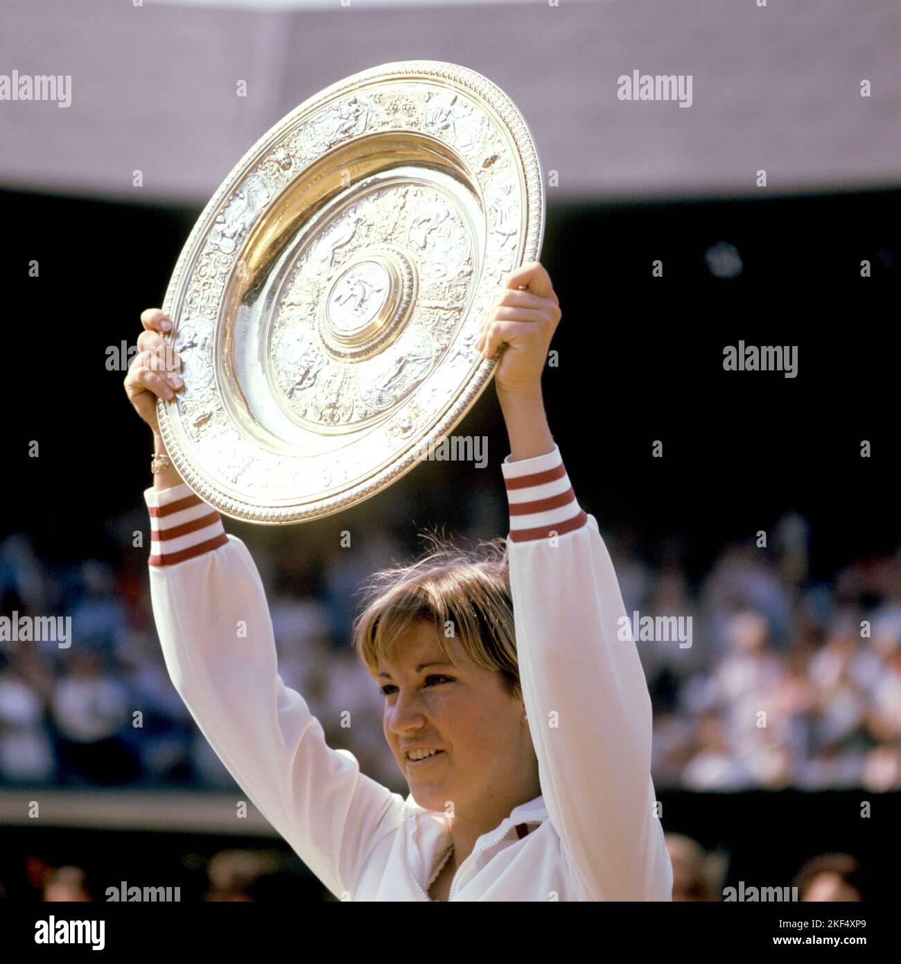 Chris Evert holds the trophy aloft after her three set victory Stock ...