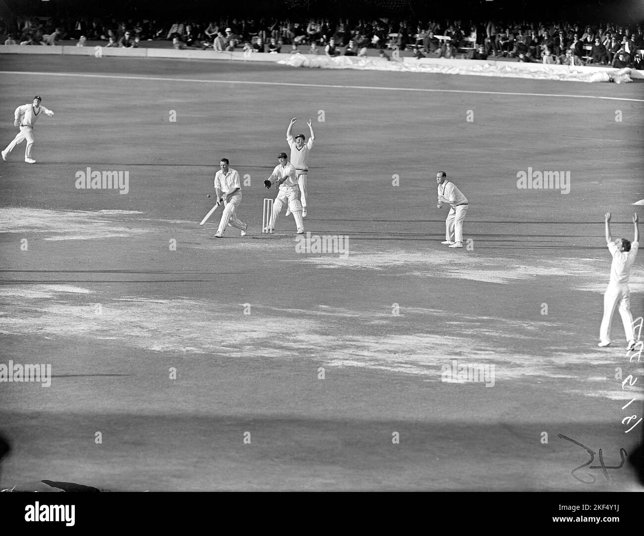 Yorkshire's Brian Close (r) and wicketkeeper Jimmy Binks (second l ...