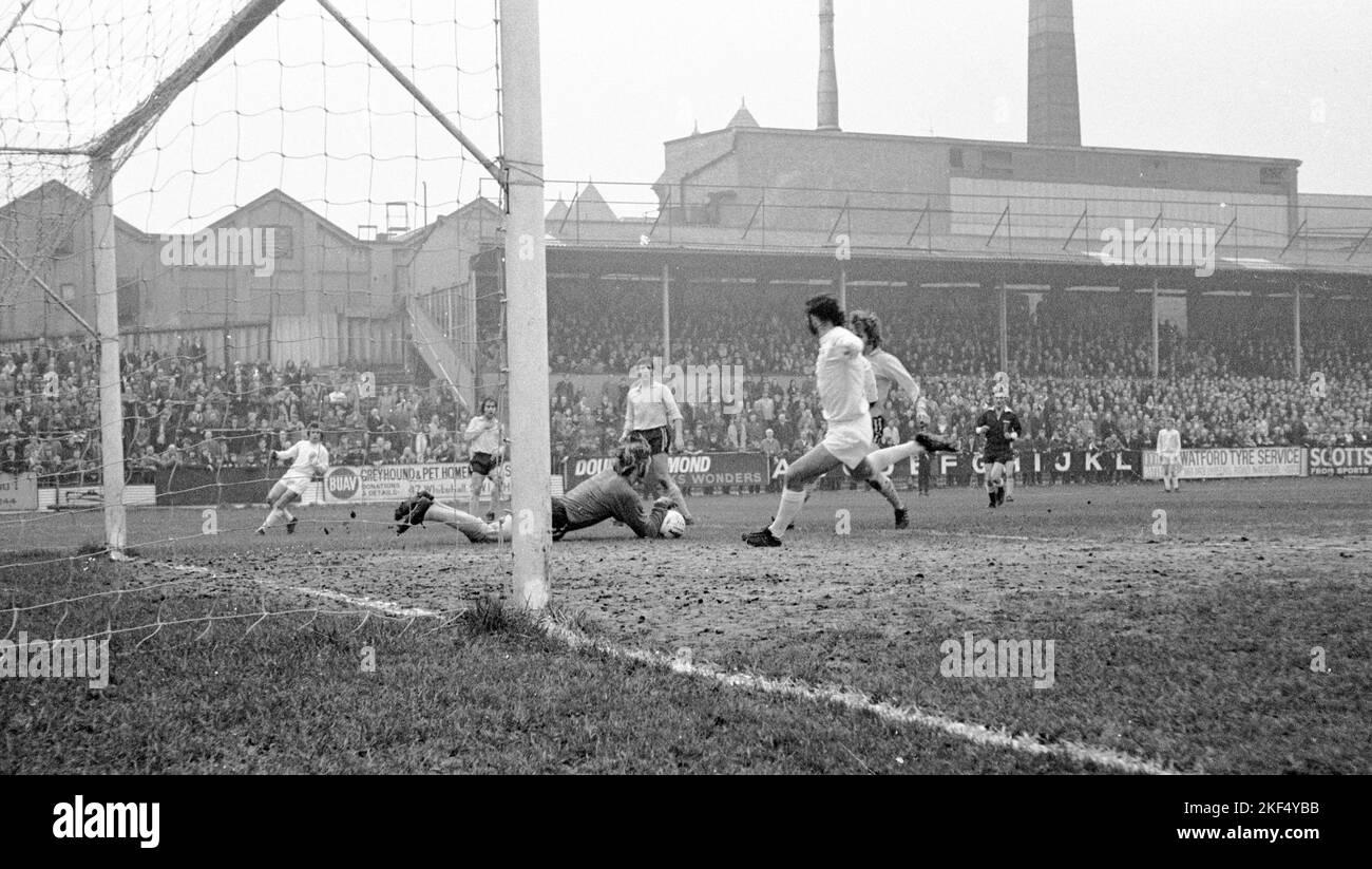 Watford goalkeeper, Mike Walker, saves a shot from Gordon Bolland ...
