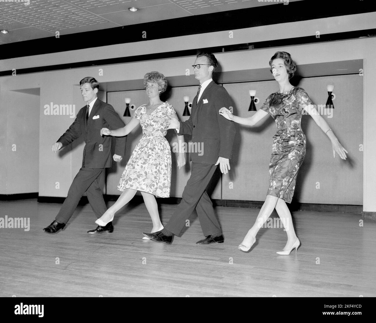 Two couples show off their moves at the Arthur Murray School of Dancing ...