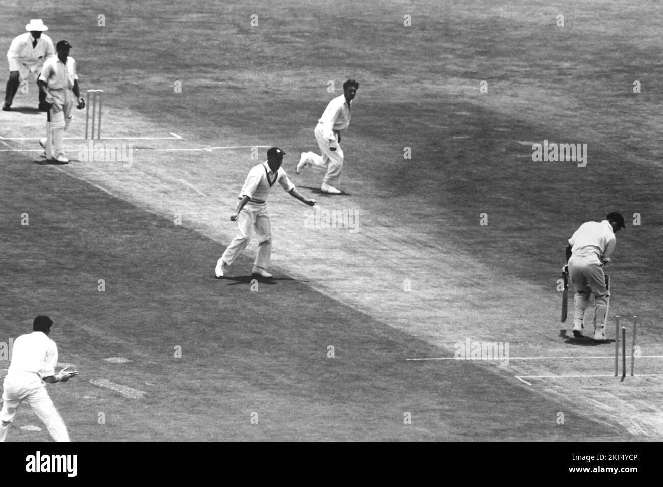 Transvaal's Peter Heine (r) is bowled by England's Brian Statham ...
