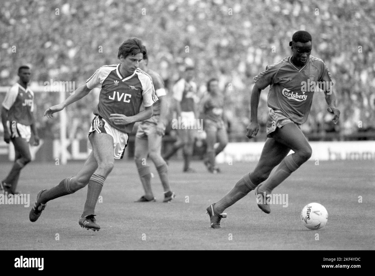 (L-R) Arsenal's Alan Smith takes on Wimbledon's Eric Young Stock Photo ...
