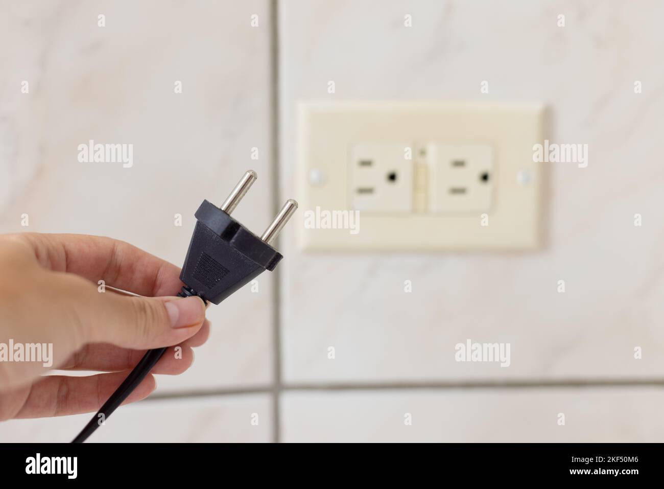 Power cable doesnt feet to the electrical plug type B. Selective focus ...