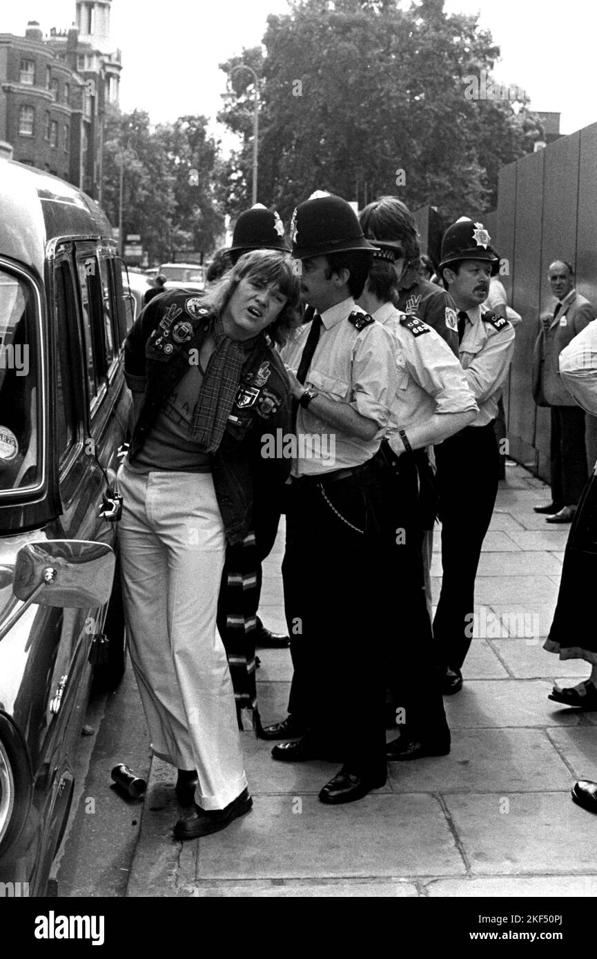 A Manchester United fan is arrested by policeman after the riot Stock ...
