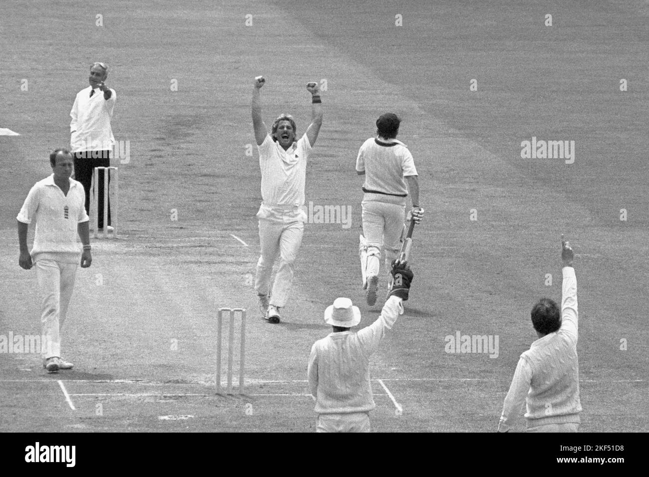 England's Ian Botham (third l) celebrates taking the wicket of ...