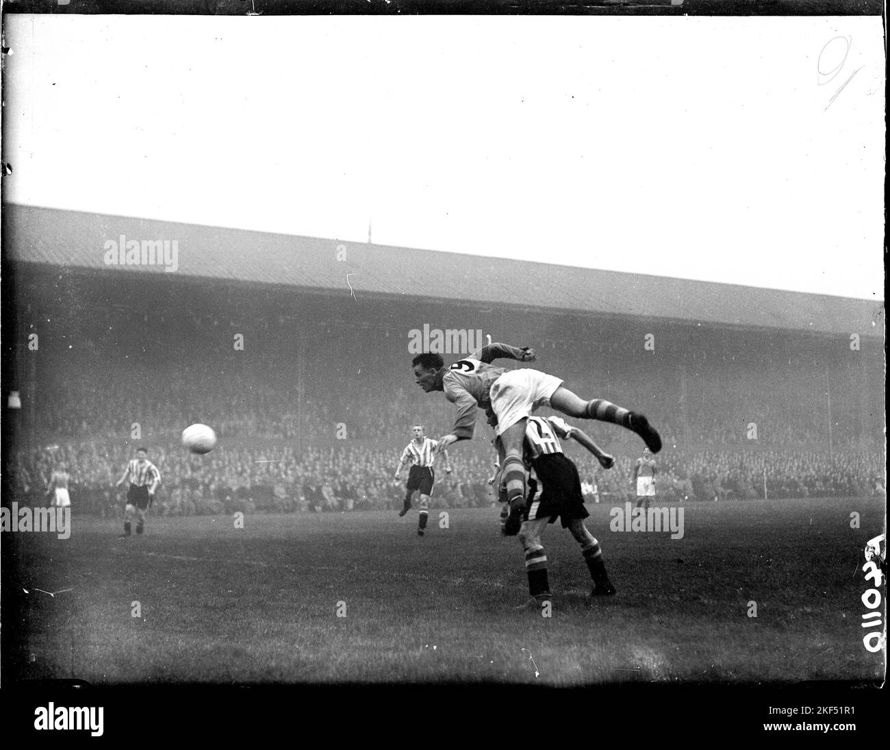Leeds United's John Charles leaps over Brentford's Marsh to score the ...