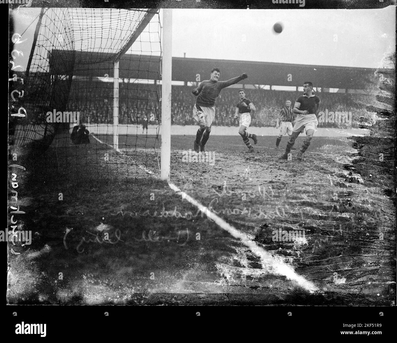 (L-R) Hull City goalkeeper George Maddison punches clear from West Ham ...