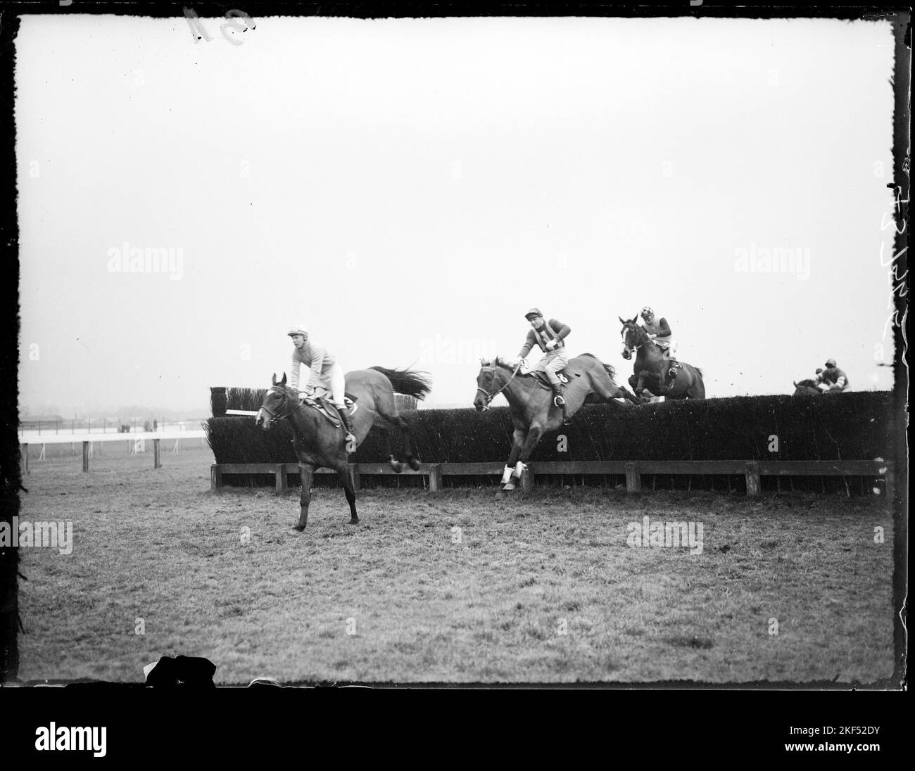 Jay Trump (l), ridden by C Smith, clears the last fence before going on ...