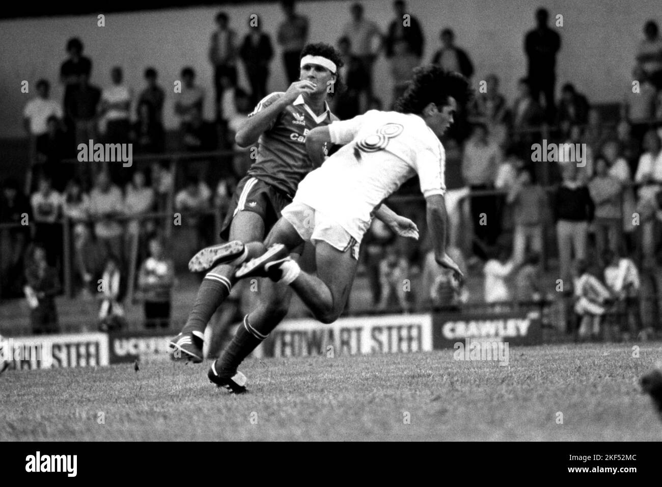 Crystal Palace's Jerry Murphy (r) is sent flying by Brighton and Hove ...