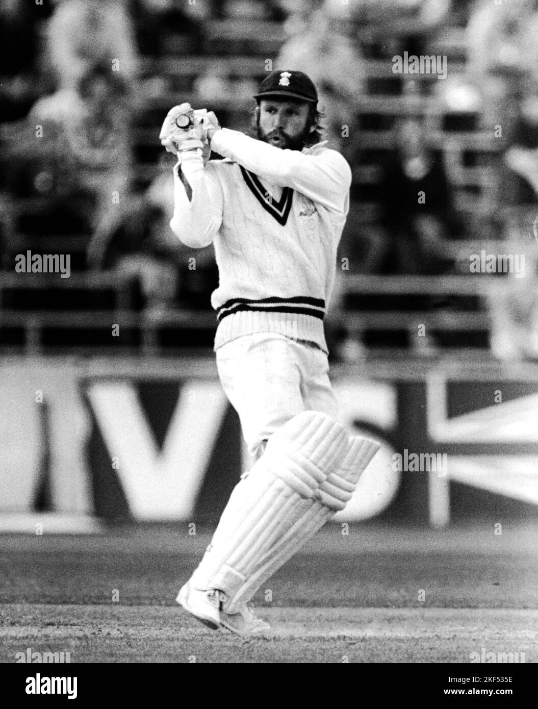 Surrey's Alan Butcher (l) hits a four to reach his 50 Stock Photo - Alamy