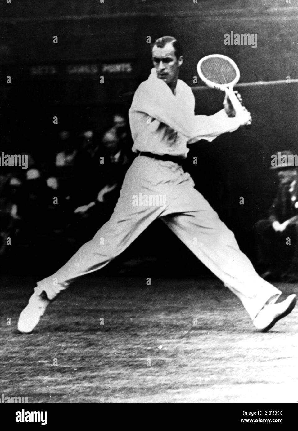 Bill Tilden in action Stock Photo - Alamy