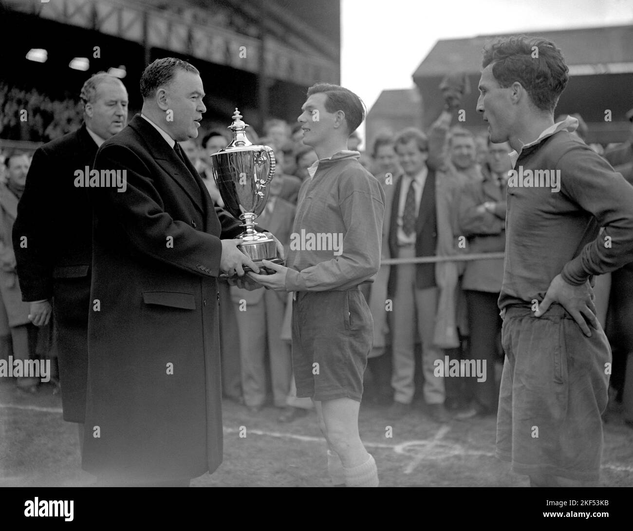 WC Ramsay, President of the Middlesex RFU (l), presents the Russell ...