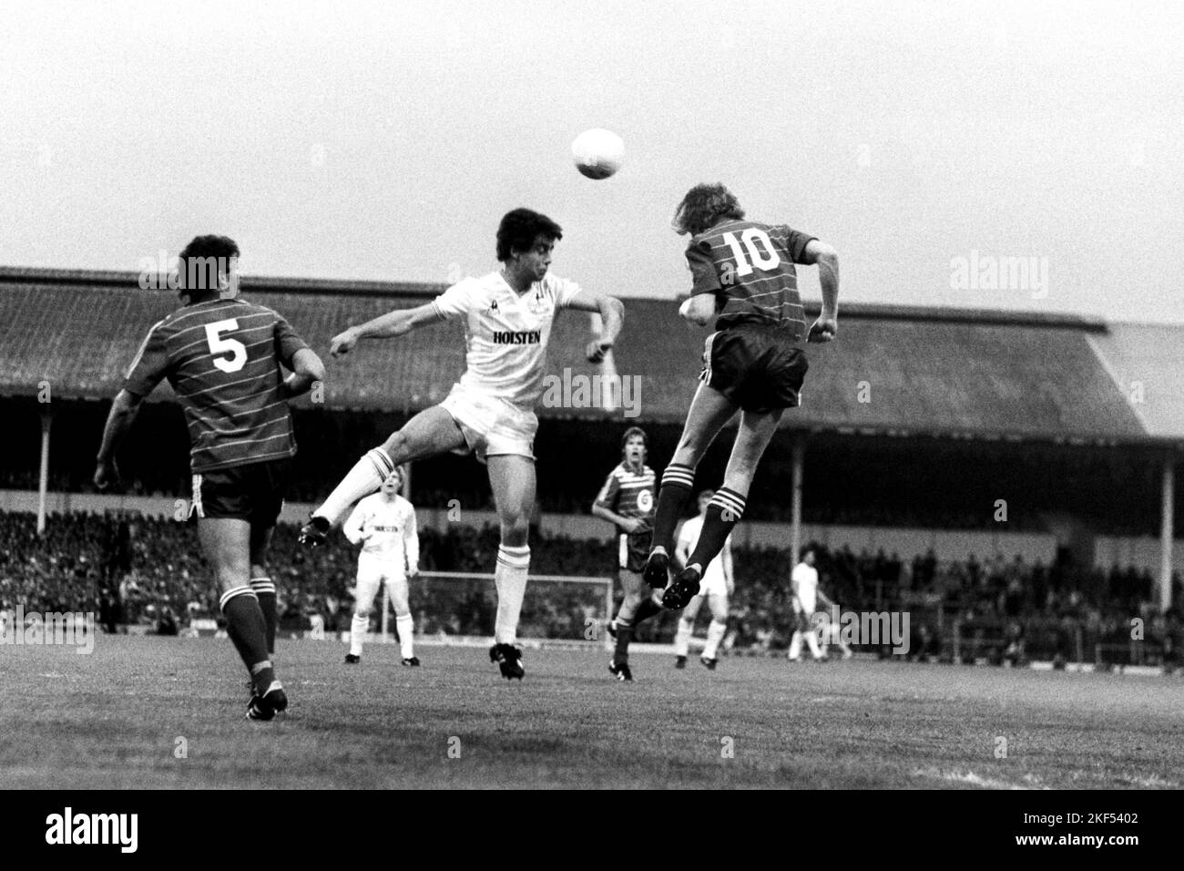 Anderlecht's Morten Olsen (r) heads clear from Tottenham Hotspur's Gary ...