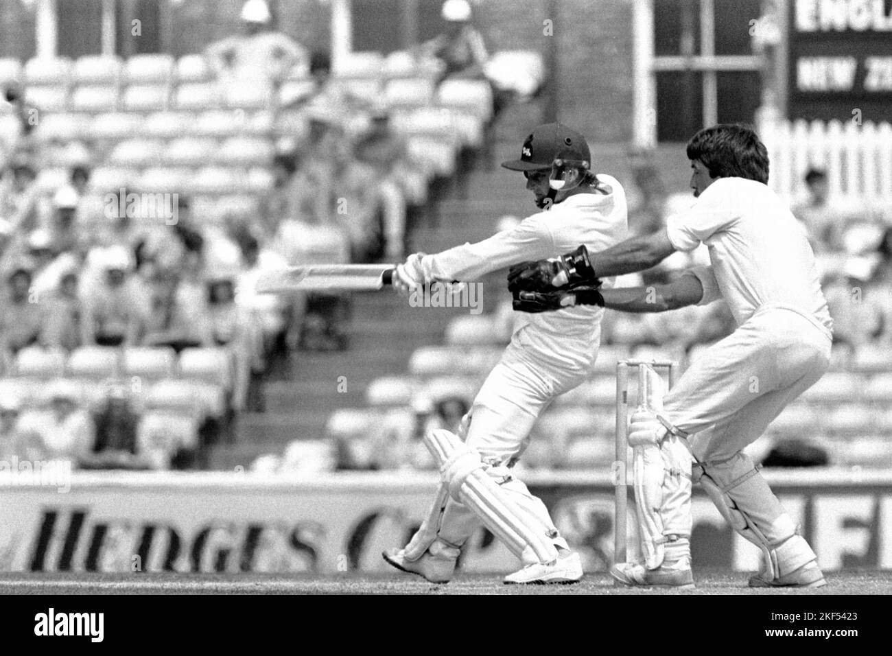 England's opening batsman Graeme Fowler hits out for the boundary off a ...