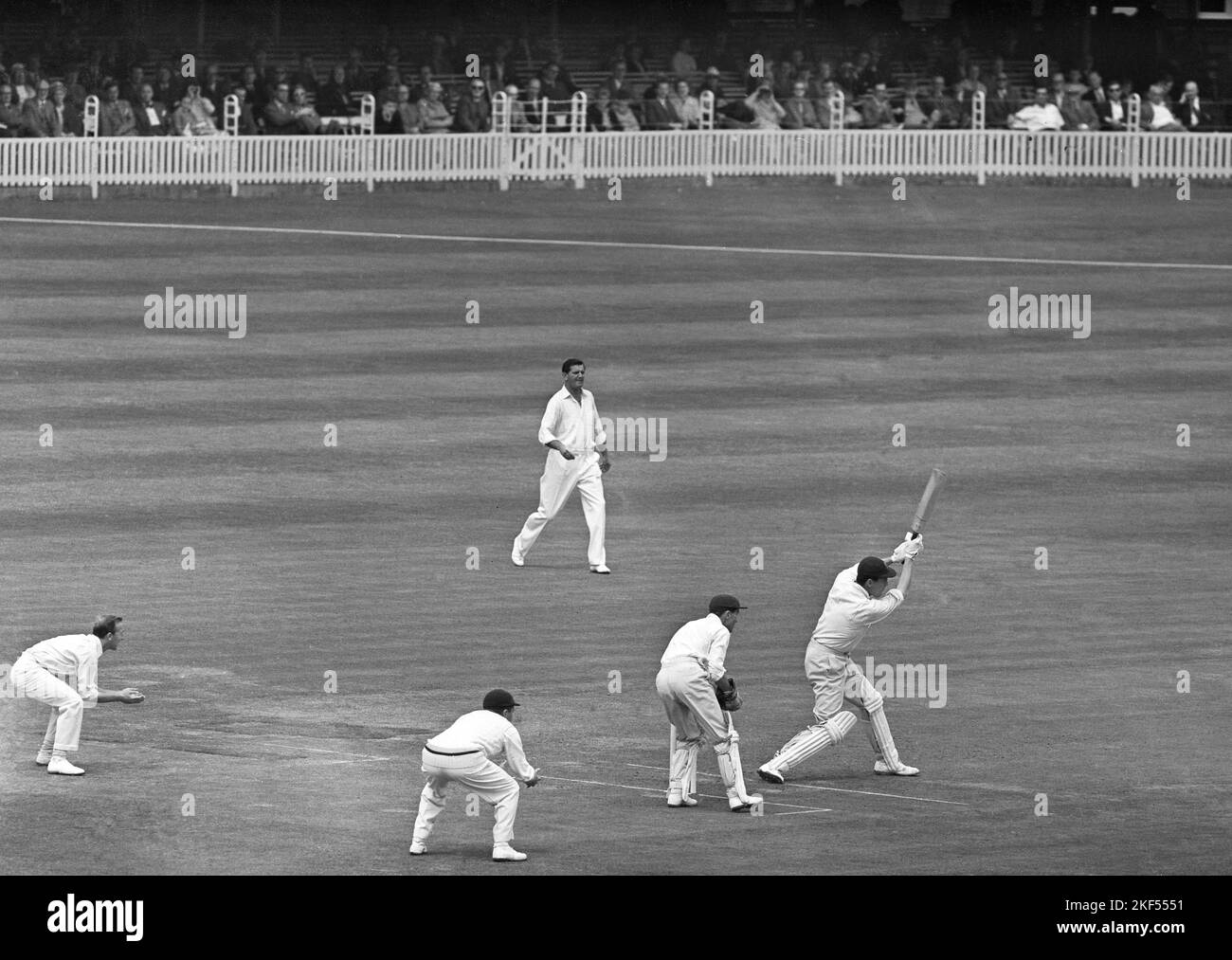 Rev. David Sheppard drives a ball from N. Gifford. The wicketkeeper is ...