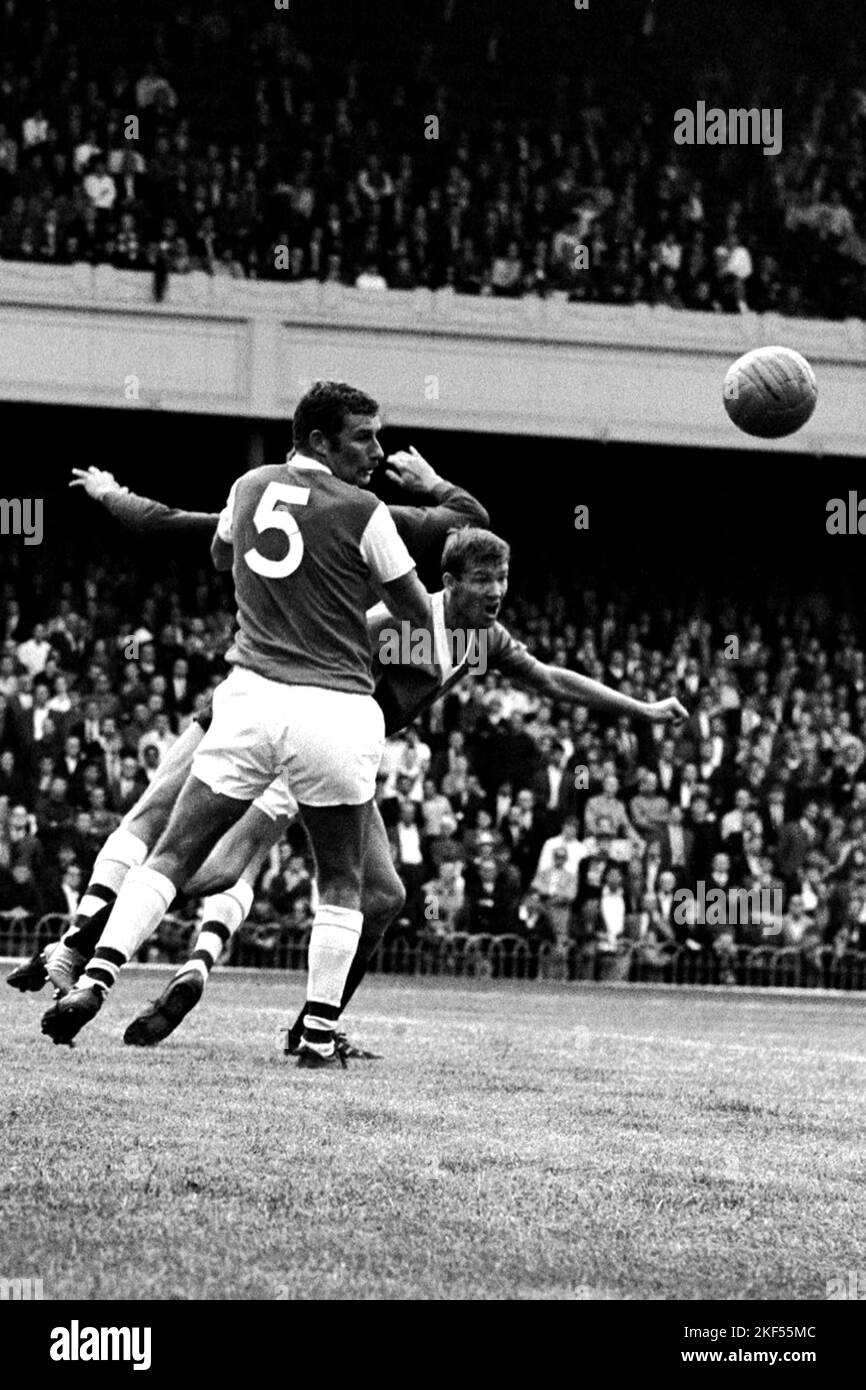 Rangers' Alex Ferguson (r) beats Arsenal's Terry Neill (l) and ...