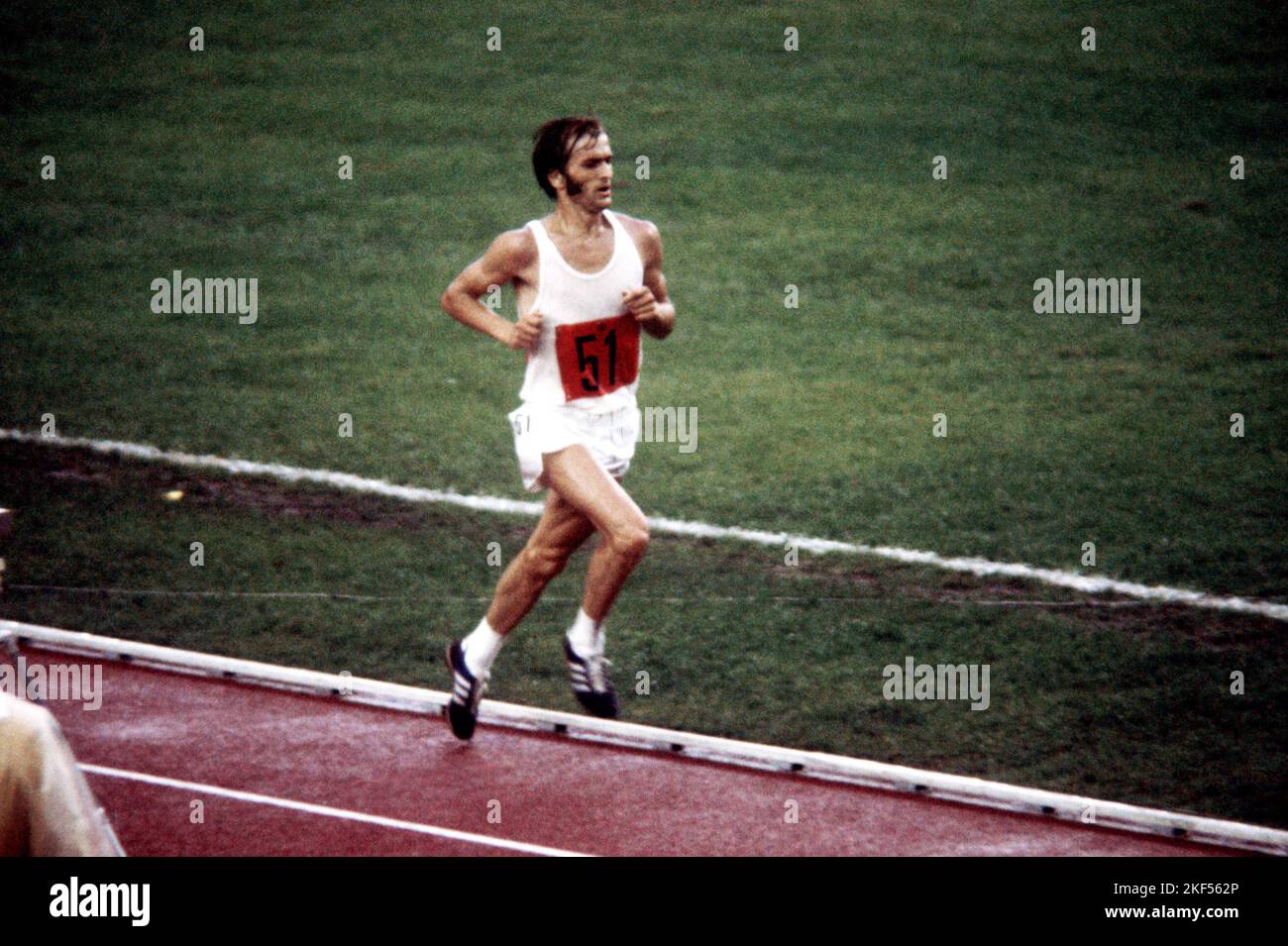 East Germany's Waldemar Cierpinski enters the stadium on his way to a ...
