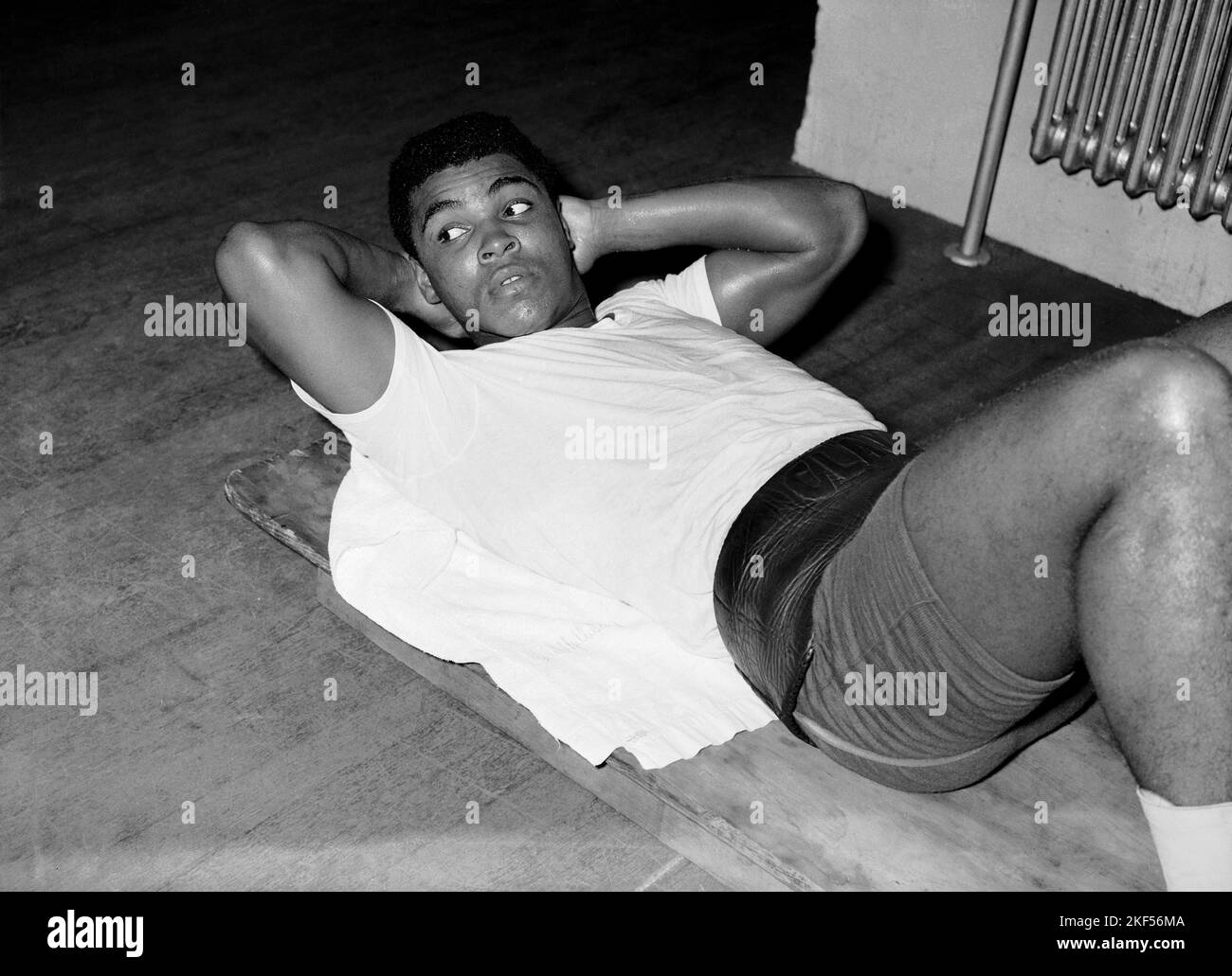 Cassius Clay in training for his fight against Henry Cooper Stock Photo ...