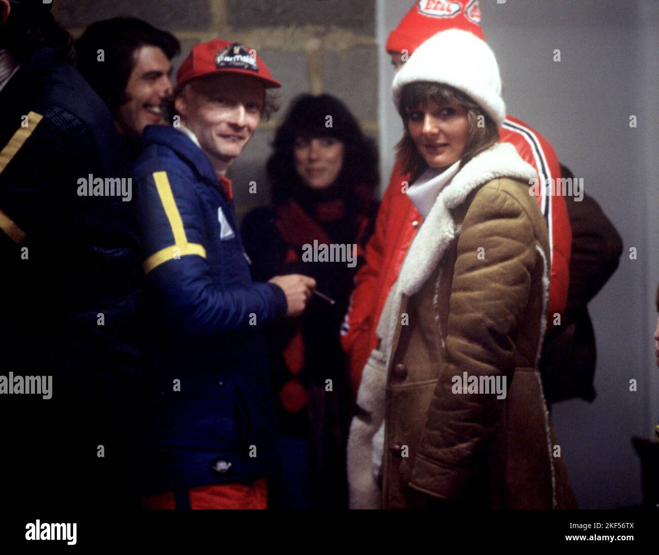 Niki Lauda (l) manages a smile despite failing to place in the ...