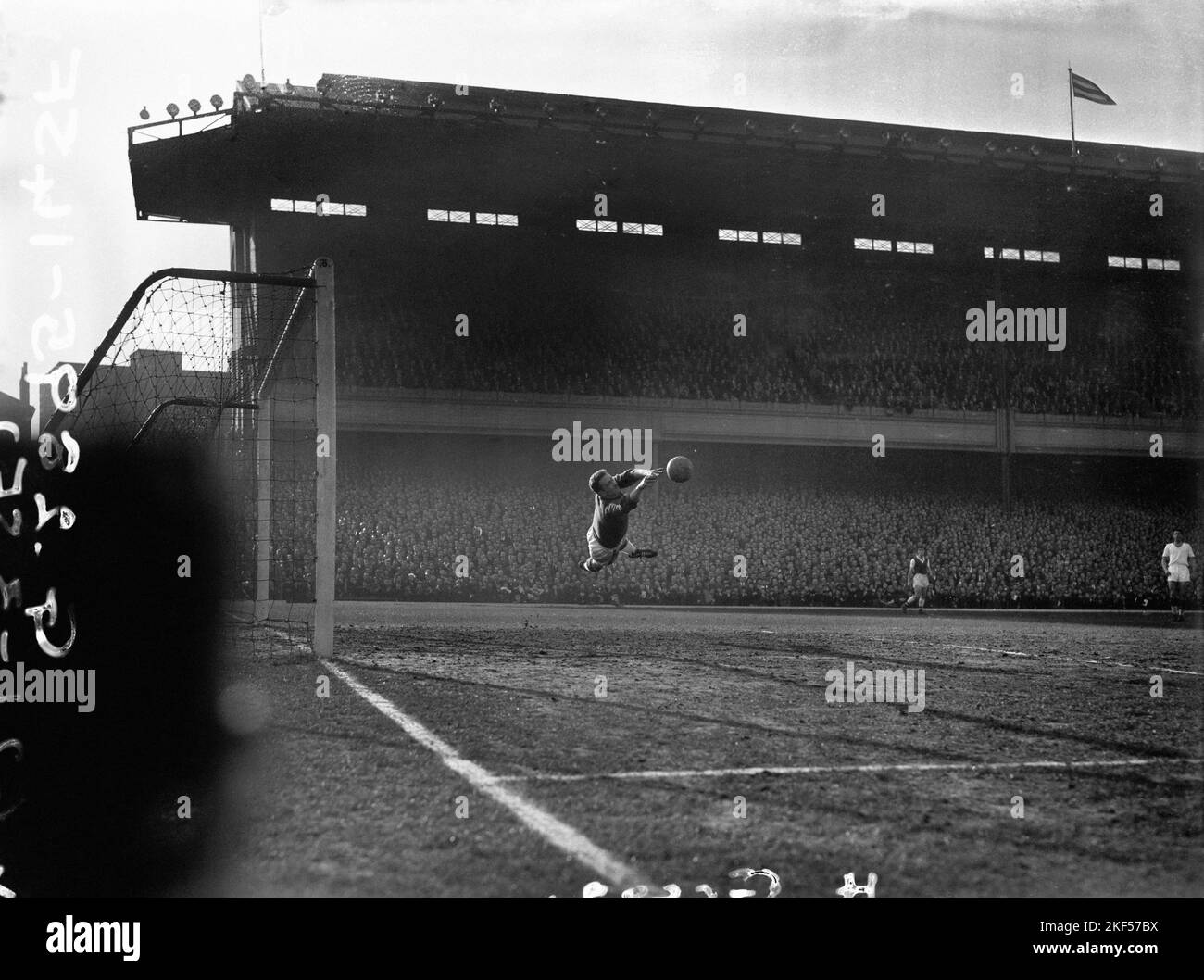Manchester United goalkeeper Harry Gregg makes a flying save Stock ...